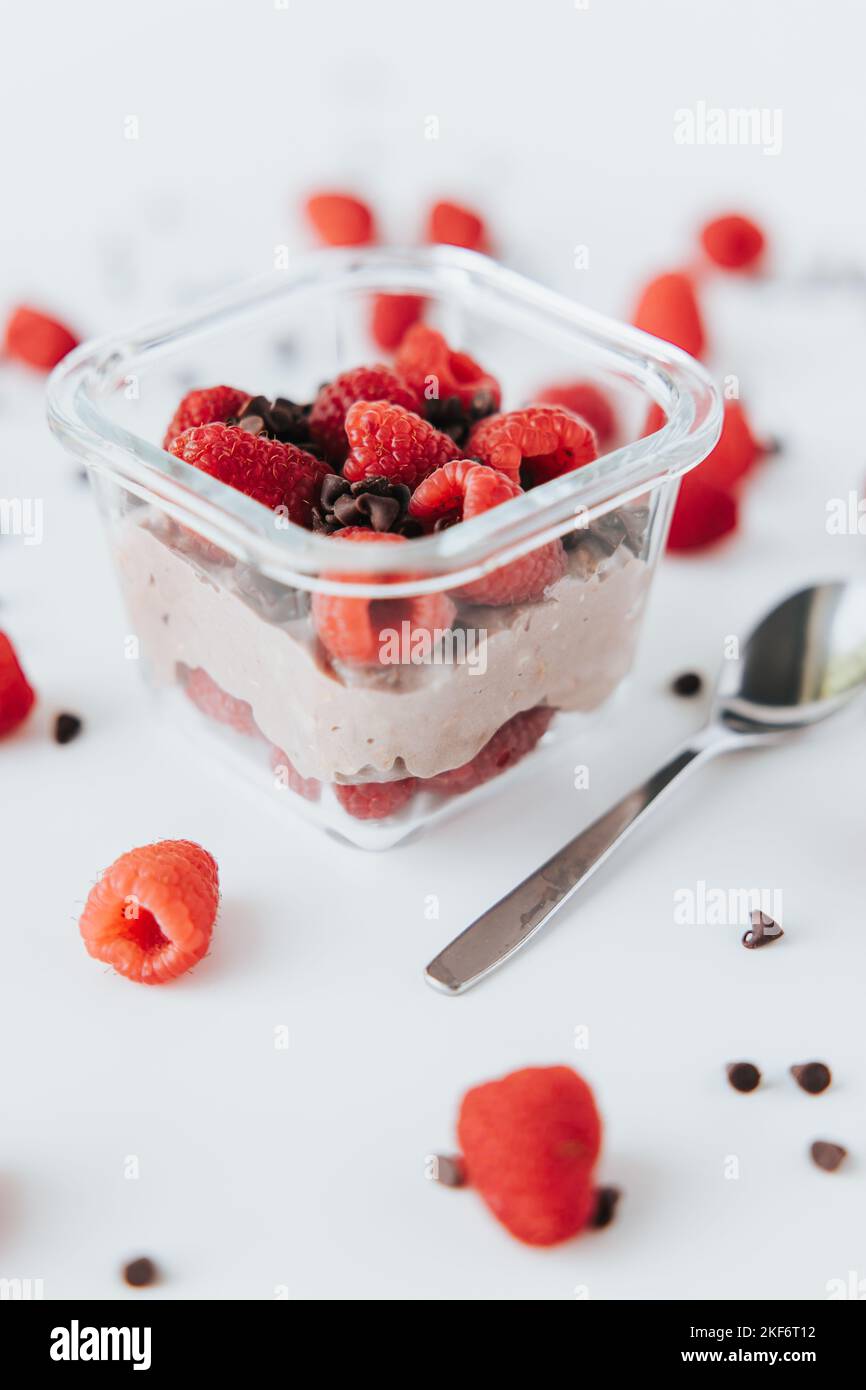 A closeup shot of a raspberry and chocolate dessert in a cup Stock ...