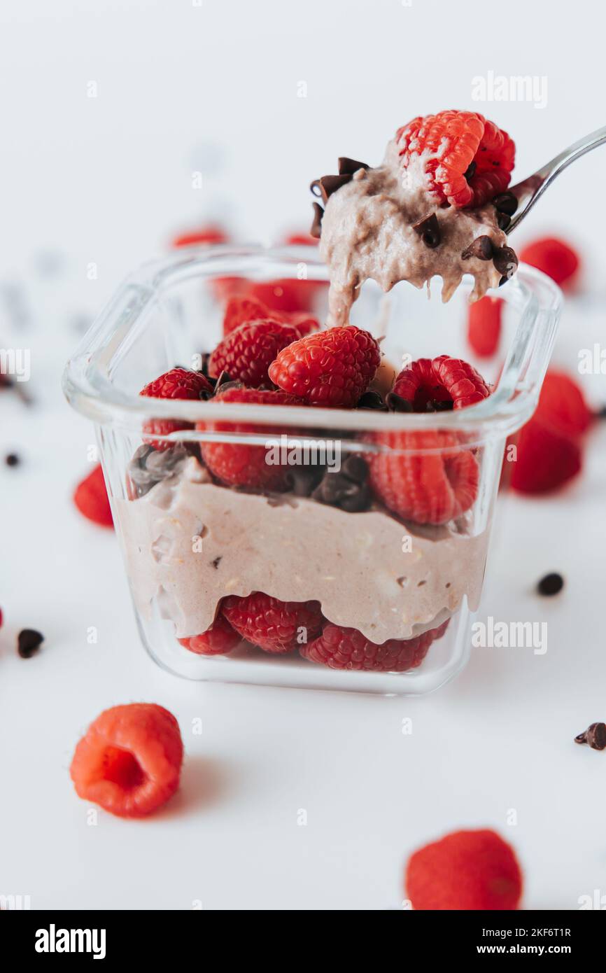 A closeup shot of a raspberry and chocolate dessert in a cup Stock ...