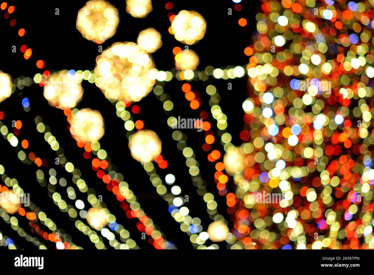 Blurred background. Beautiful luminous and flashing New Year and ...