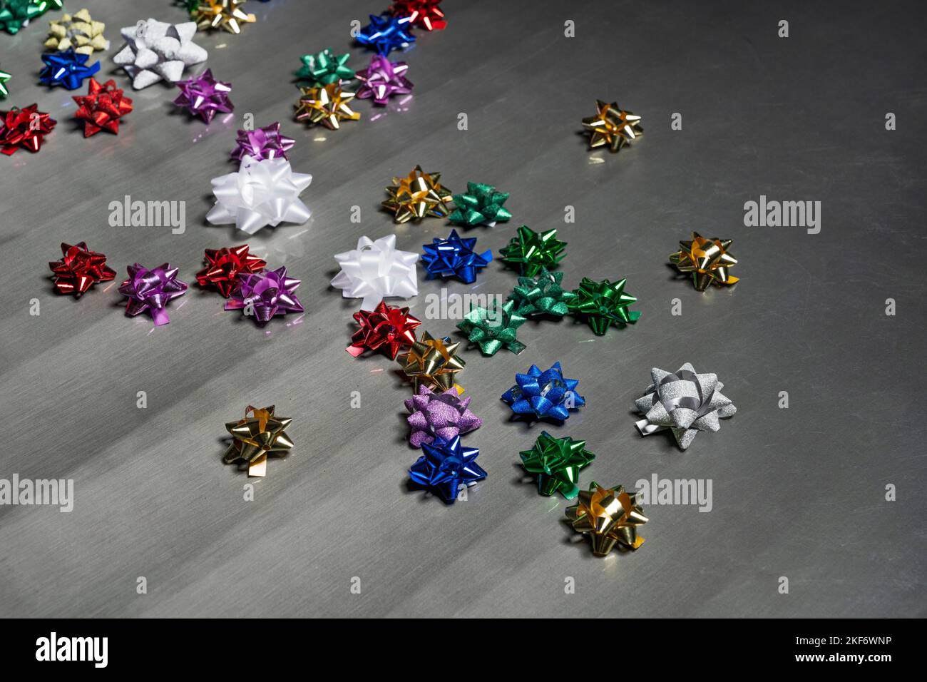 Wrapping paper stars in bold colors, bright white, gold, cobalt blue ...