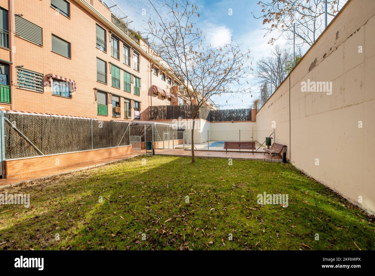 Facades of urban residential buildings with landscaped common areas and ...