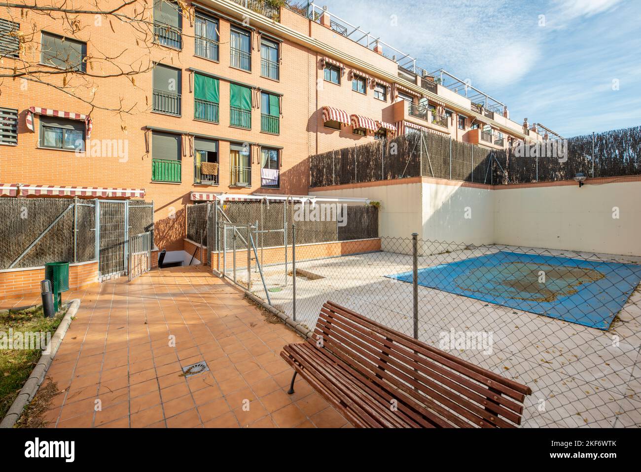 Facades of urban residential buildings with landscaped common areas and ...