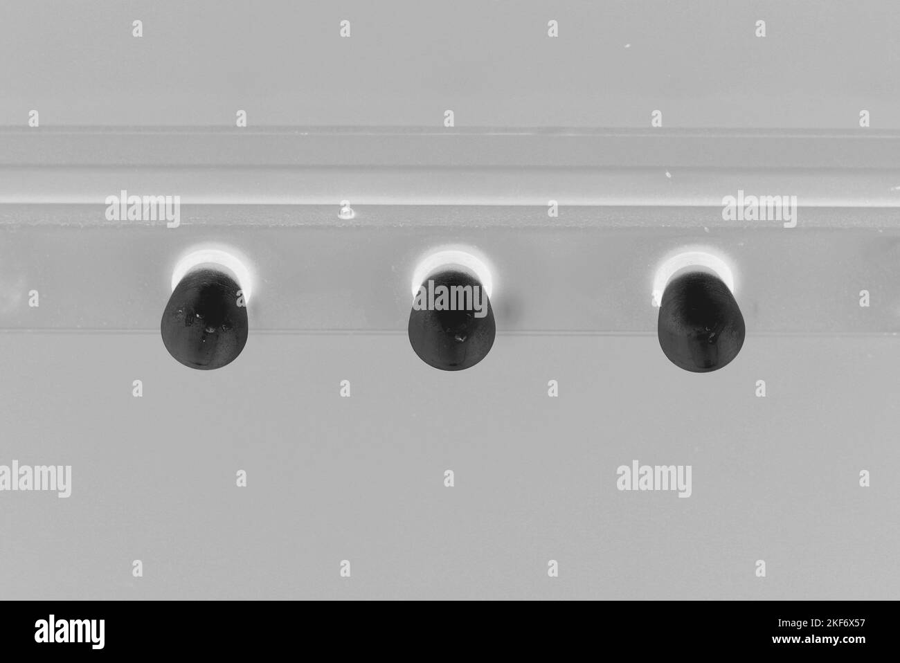 Three typical light bulbs in a black and white film negative Stock ...