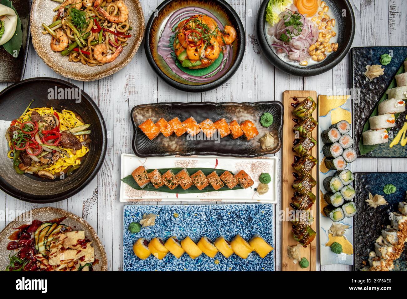 Peruvian Japanese fusion food platter with ceviche, pan bao, prawn stew ...