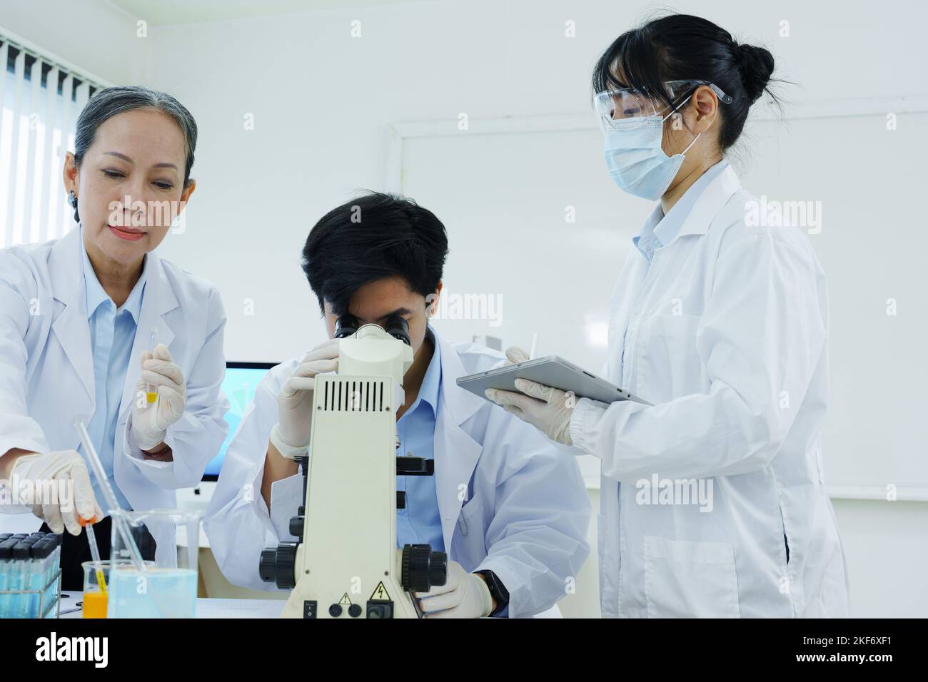 scientists analyze chemical samples Discuss technological innovations ...