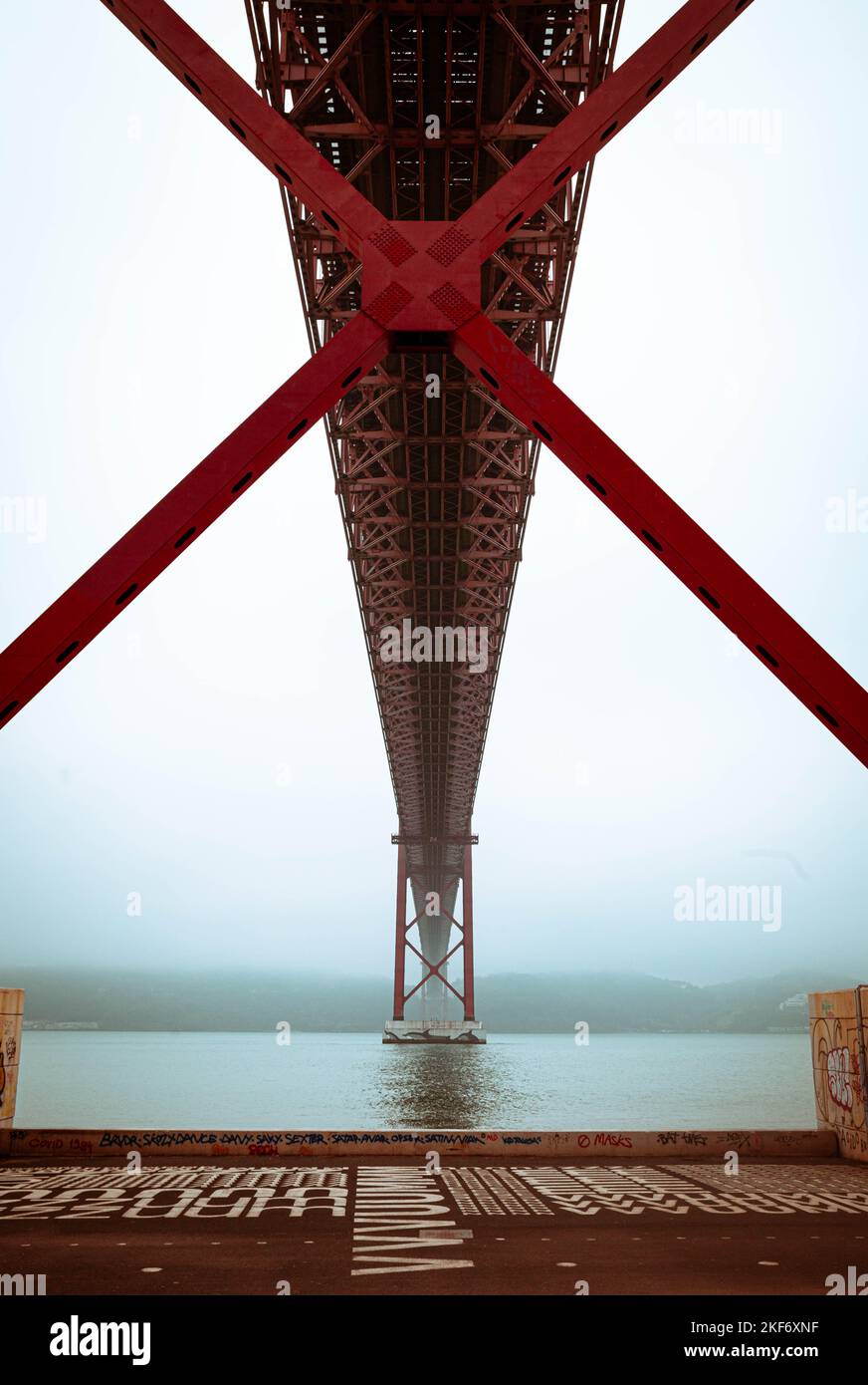 A vertical low angle of underneath the Golden Gate bridge in San ...