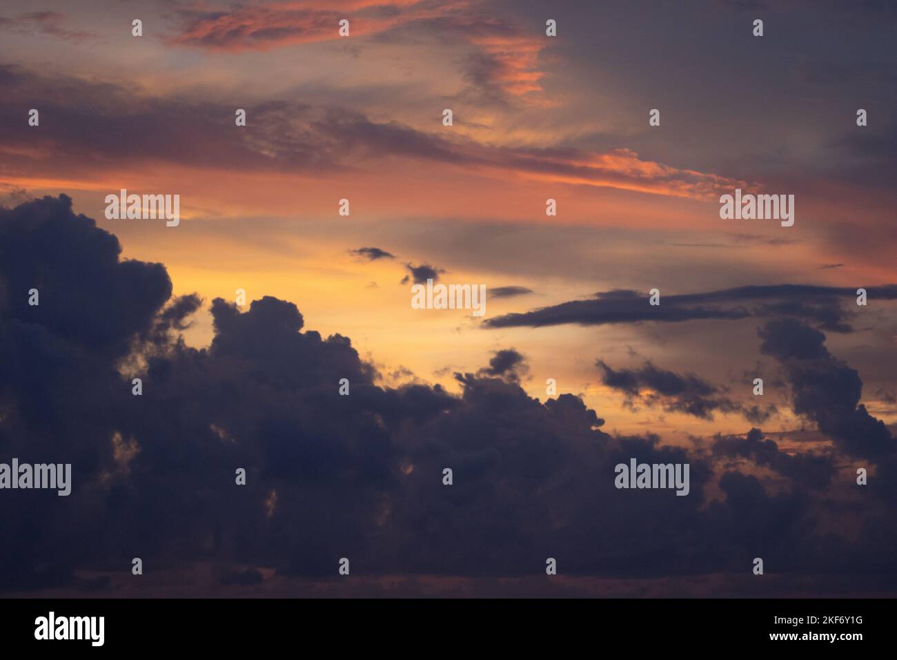 Beautiful color when the sun goes down in Kuta Beach Stock Photo - Alamy
