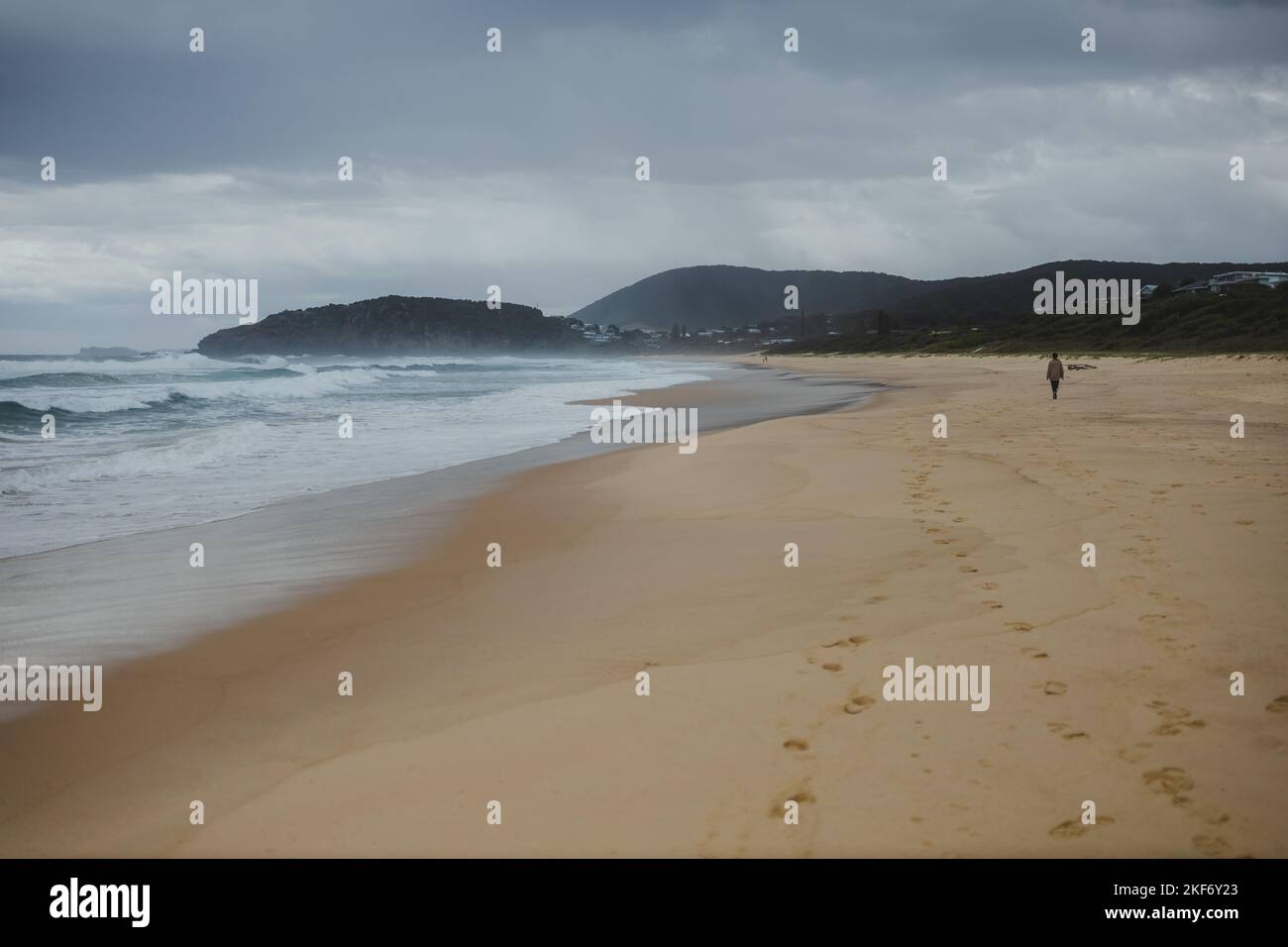 Wide Shot Of A Moody Beach With Dark Clouds In Australia Stock Photo ...