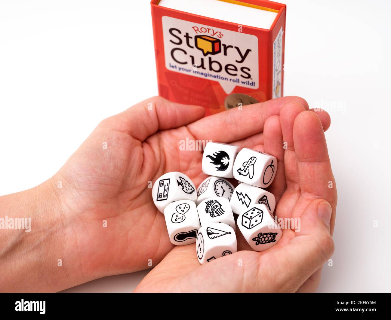 Tambov, Russian Federation - November 09, 2022 A woman palms holding 9 cubes. The box of Rory's ...