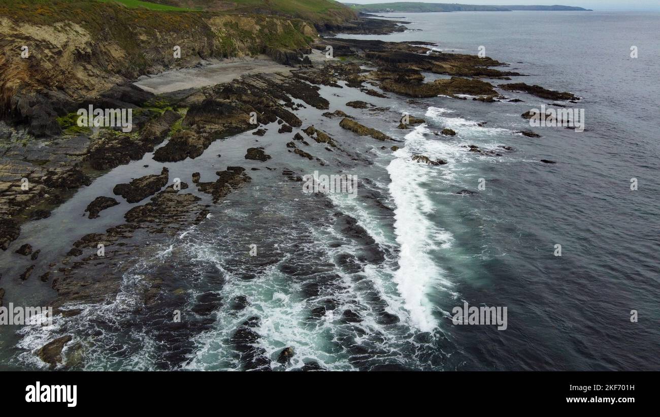 Tidal waves of the Atlantic Ocean. Rocks on the coast of the island of ...