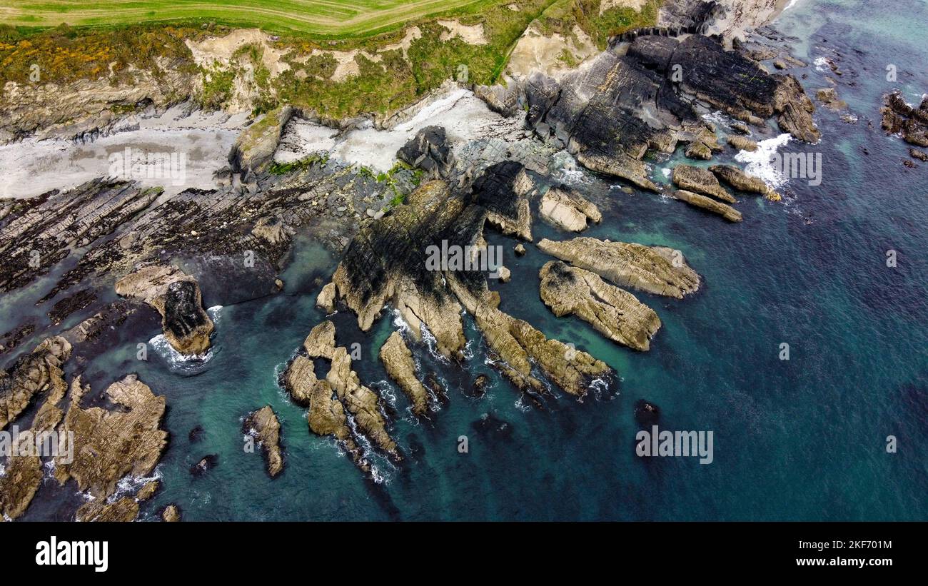 Rocks on the Irish coast, top view. The coast of the Atlantic Ocean ...