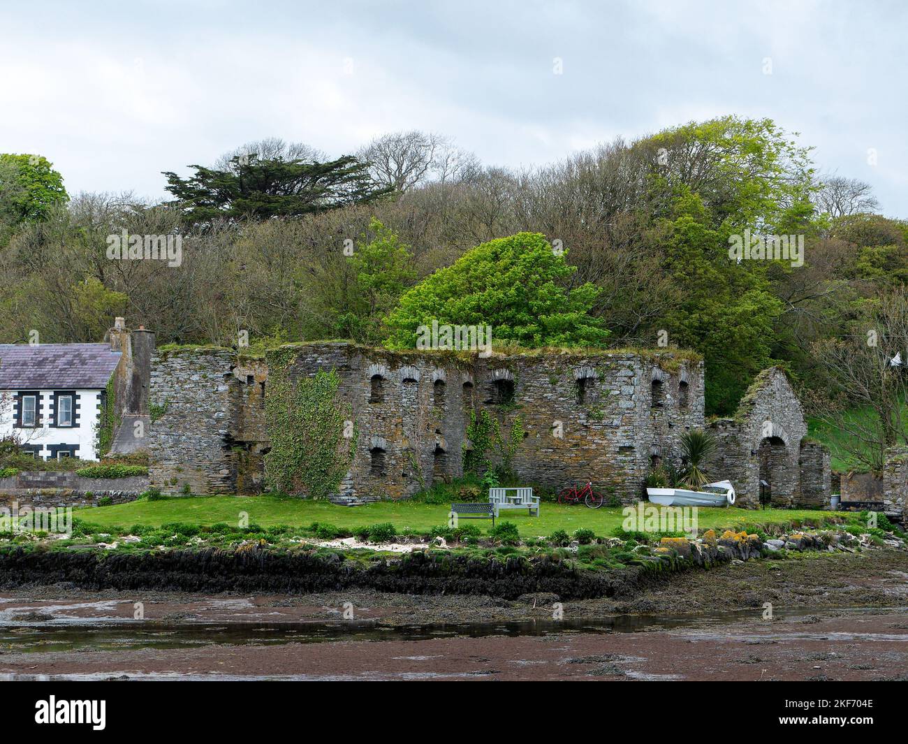 The Arundel grain store, shore of Clonakilty Bay in the spring. An old ...