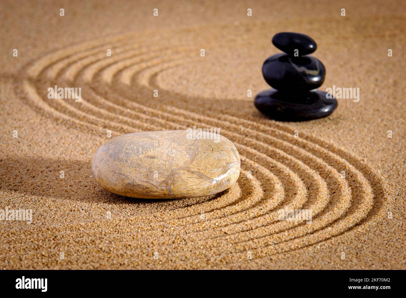 textured sand and stone in Japanese zen garden Stock Photo - Alamy