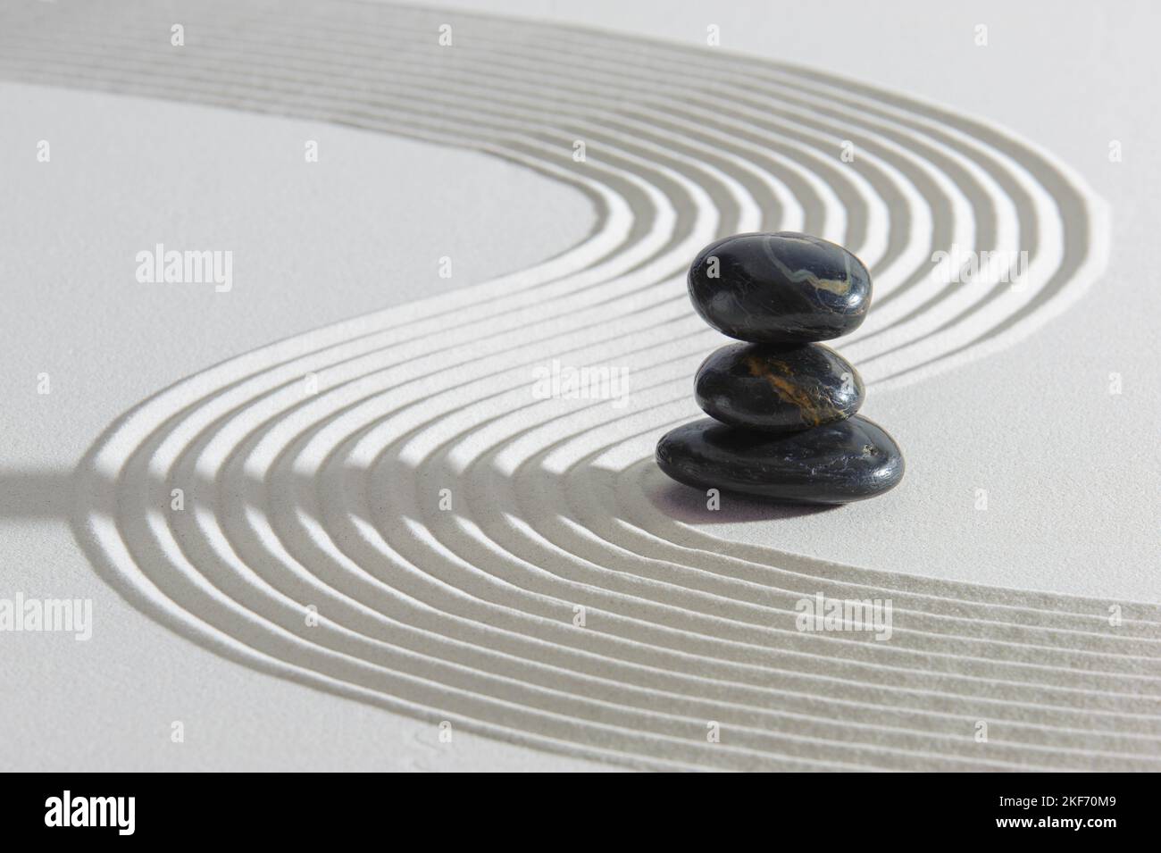 textured sand and stone in Japanese zen garden Stock Photo - Alamy
