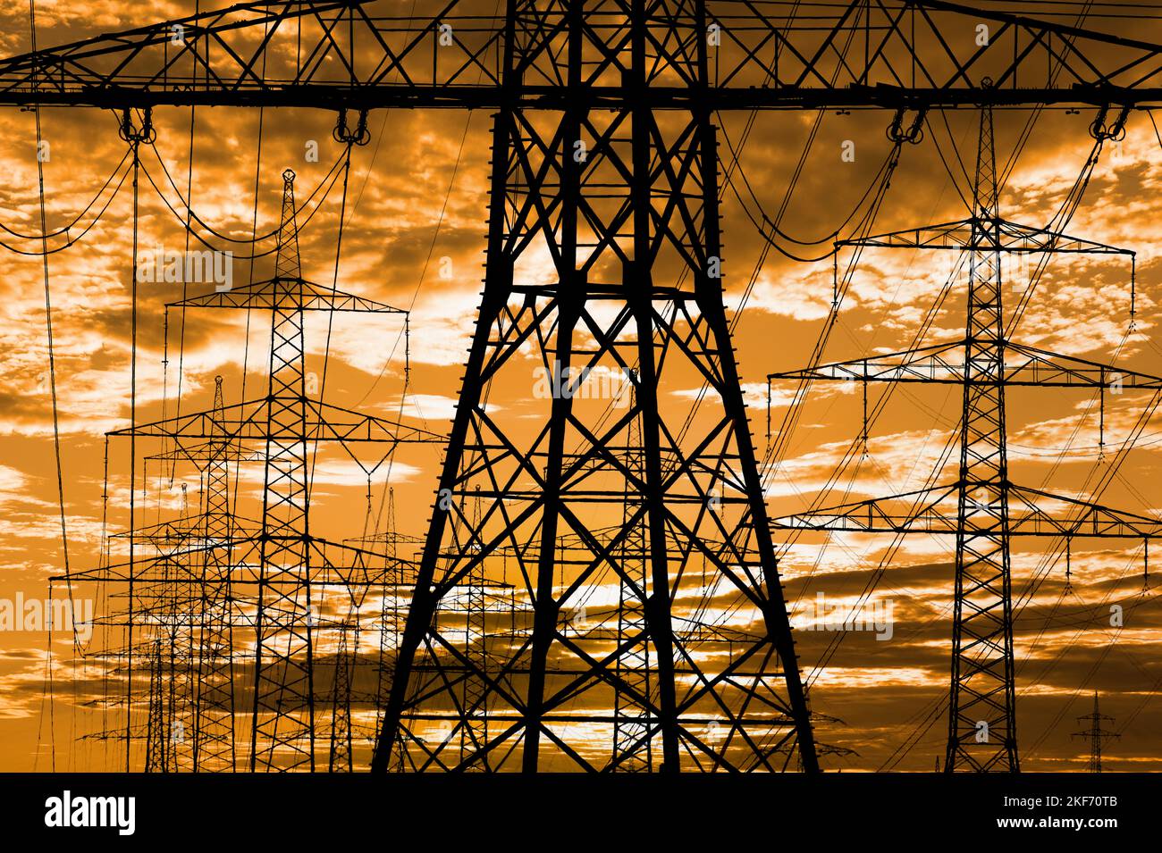 pylons and high voltage cable for electricity and energy Stock Photo ...