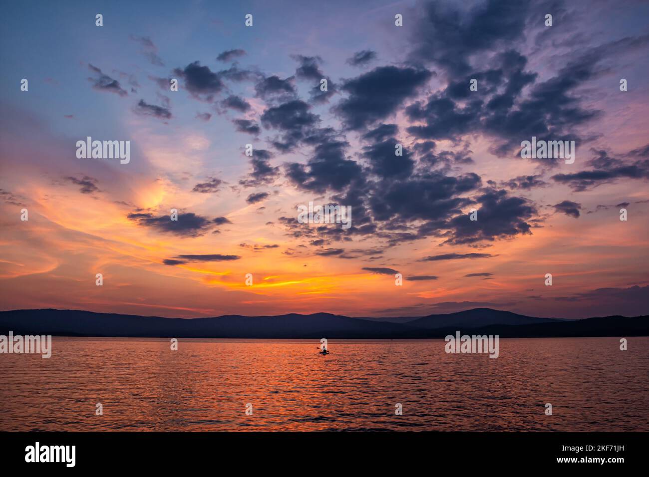 A beautiful lake against the backdrop of a picturesque sunset Stock ...