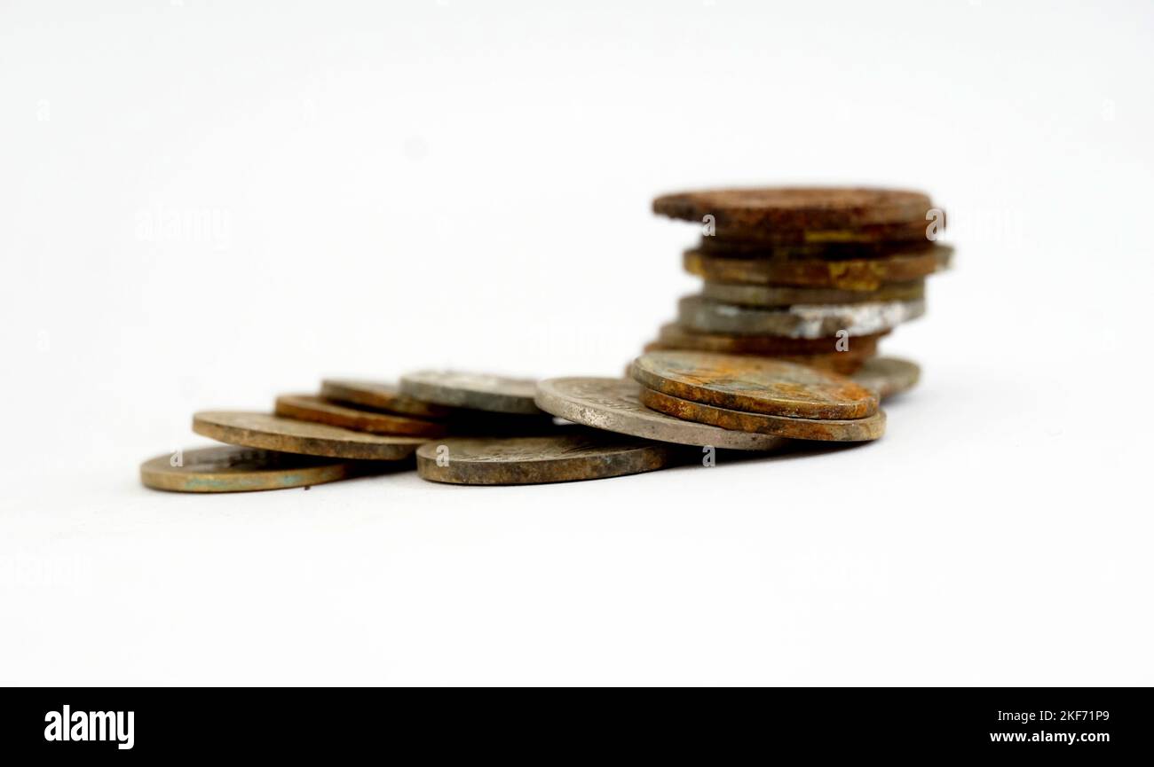 rusty vintage coins on a white Stock Photo - Alamy
