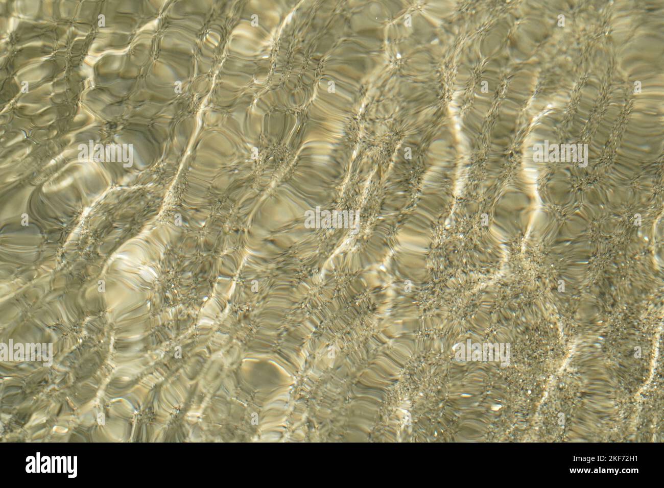 gold flakes in a river underwater Stock Photo - Alamy