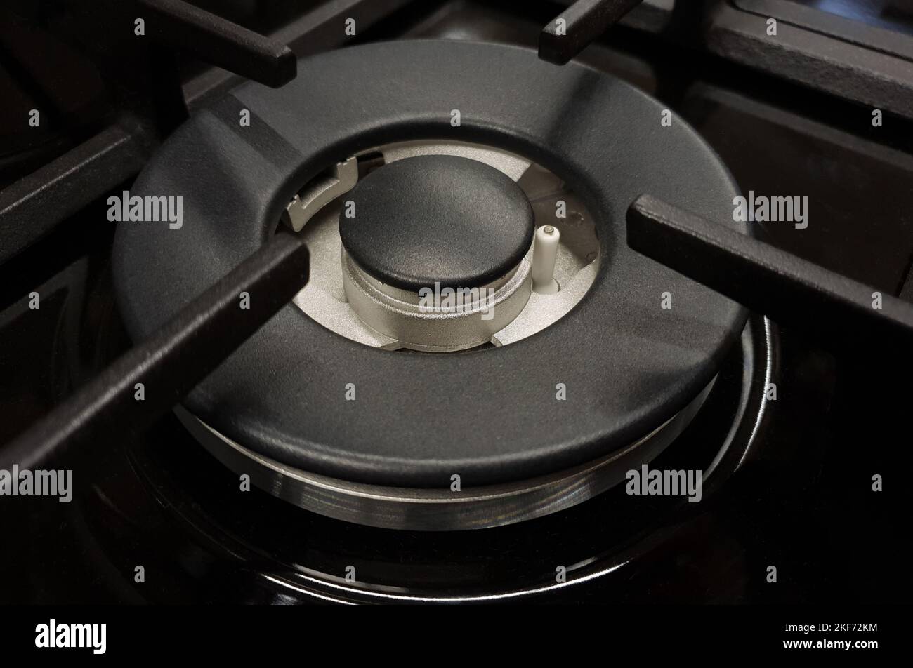 a close-up of a gas stove burner without a flame, empt Stock Photo - Alamy