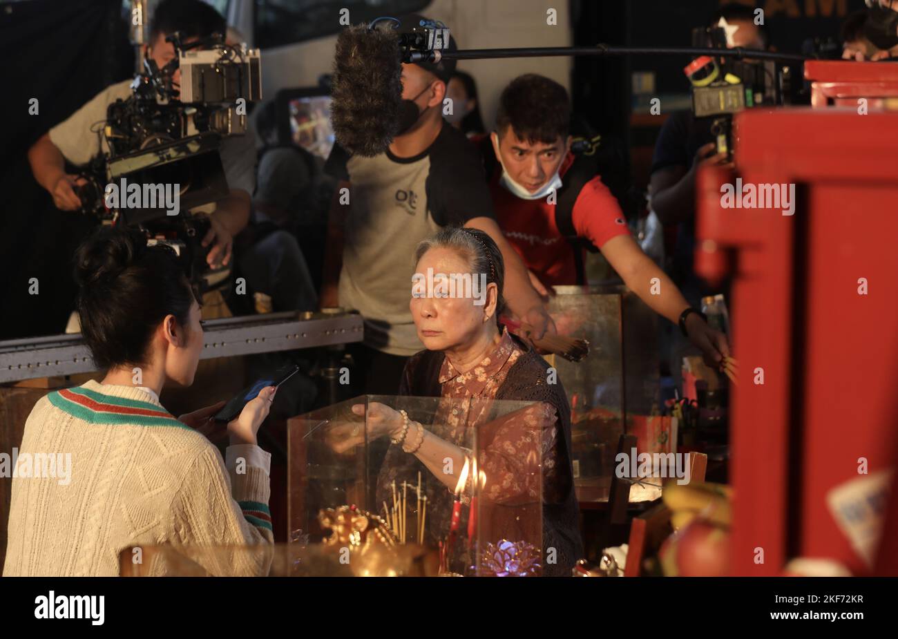 Actress Bonnie Wong Man-wai (c) in a movie scene being captured in Wan ...