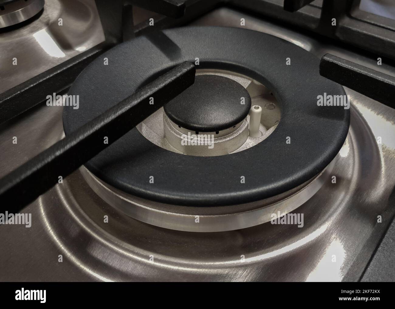 a close-up of a gas stove burner without a flame, empt Stock Photo - Alamy