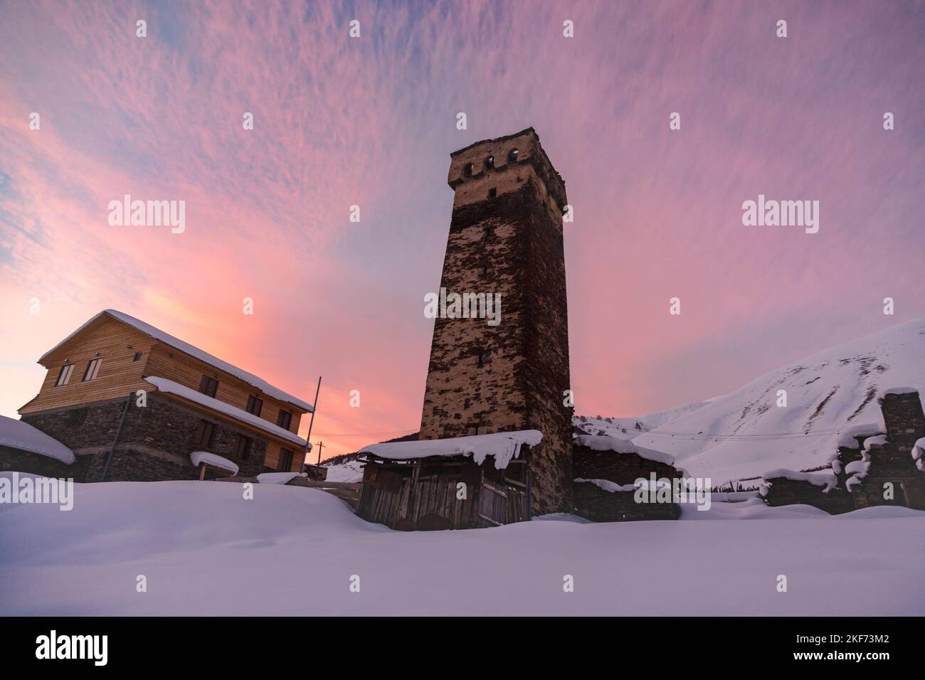 Svan towers durring sunset attached to residential houses in the ...