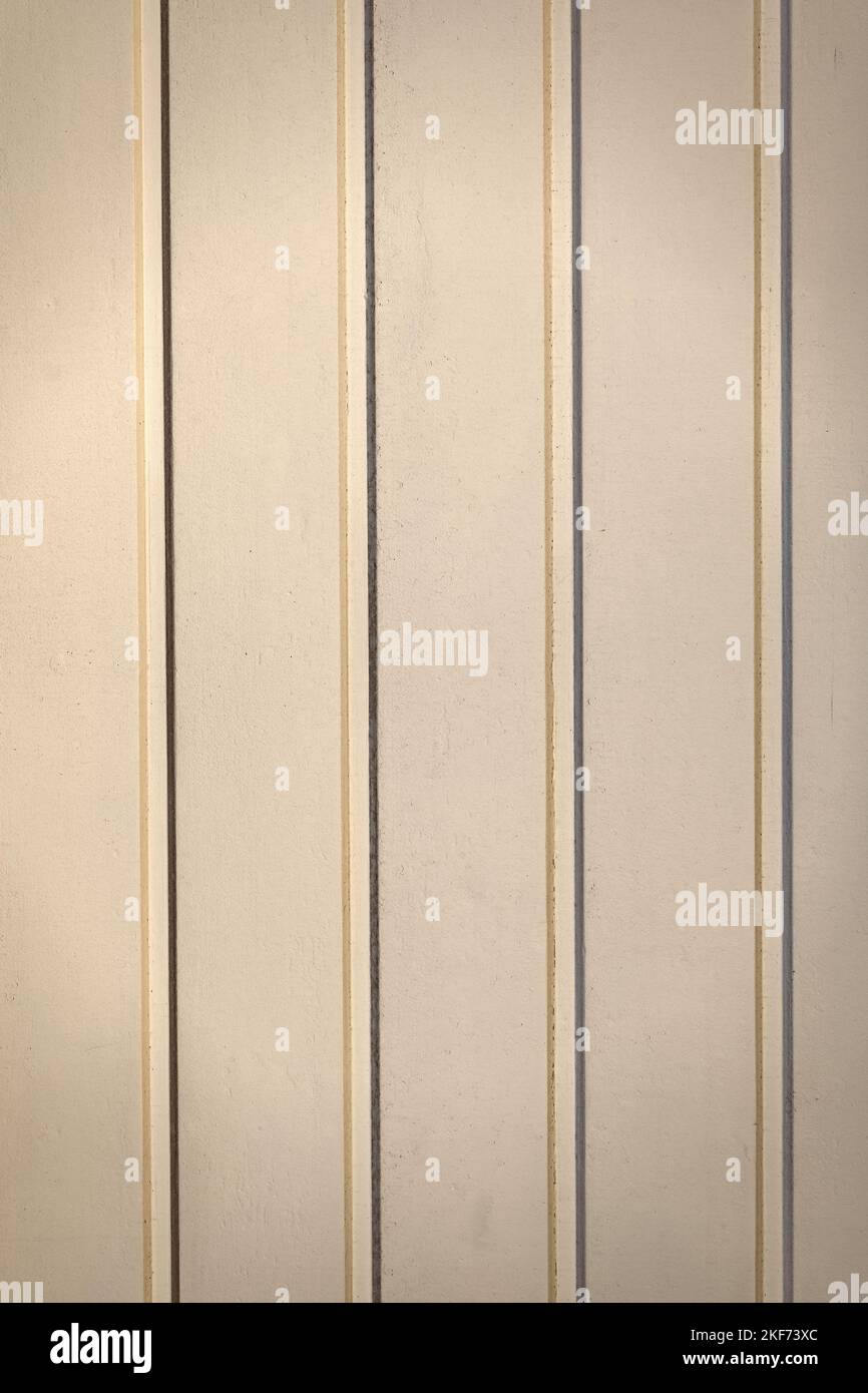 Vertical blue and beige stripe all-over wallpaper pattern on white ...