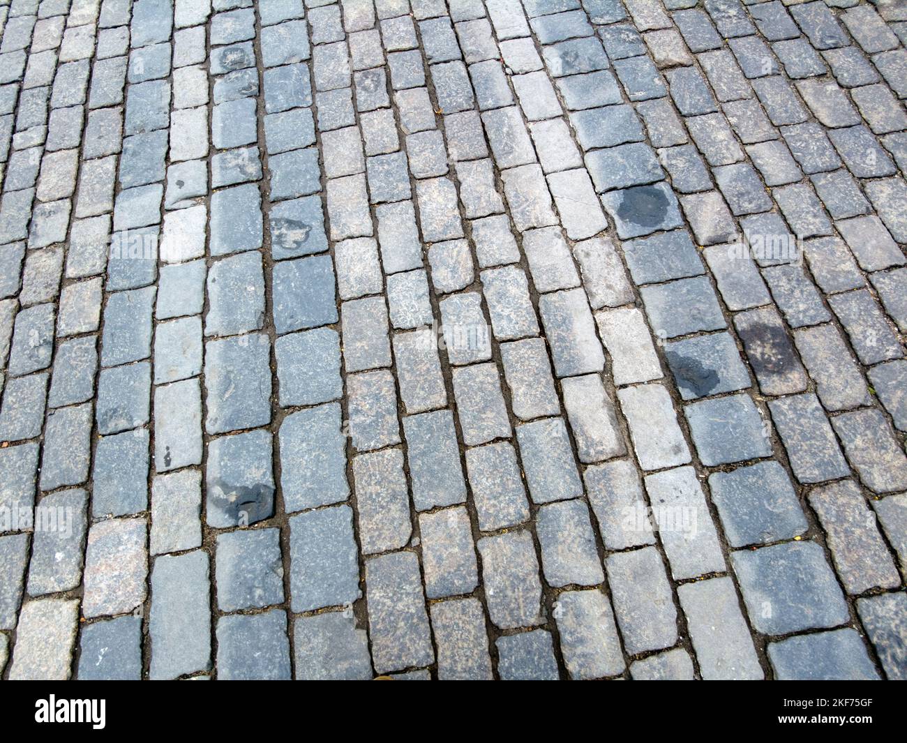 Old paving stones made of natural stone on Red Square Stock Photo - Alamy