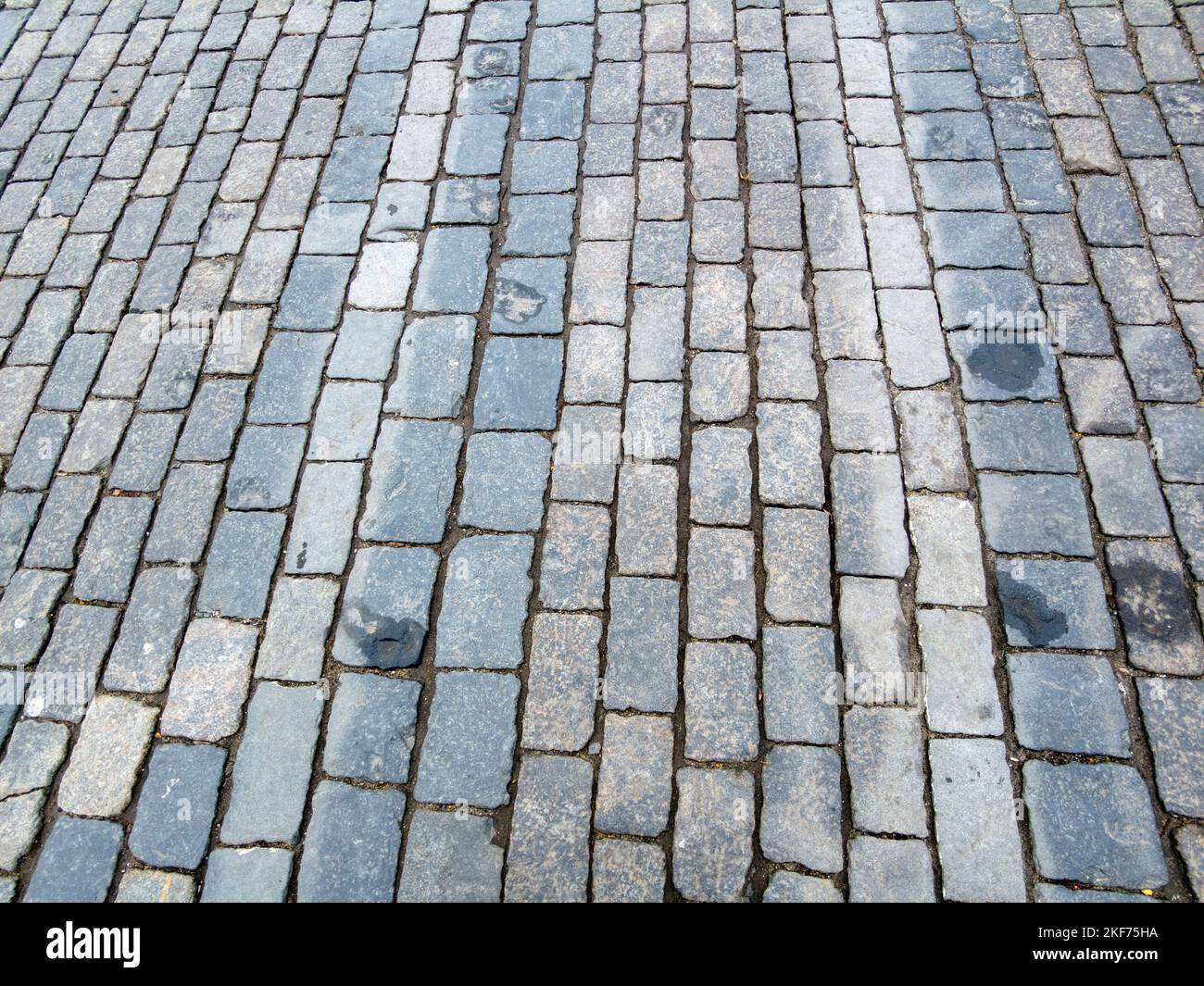 Old paving stones made of natural stone on Red Square Stock Photo - Alamy