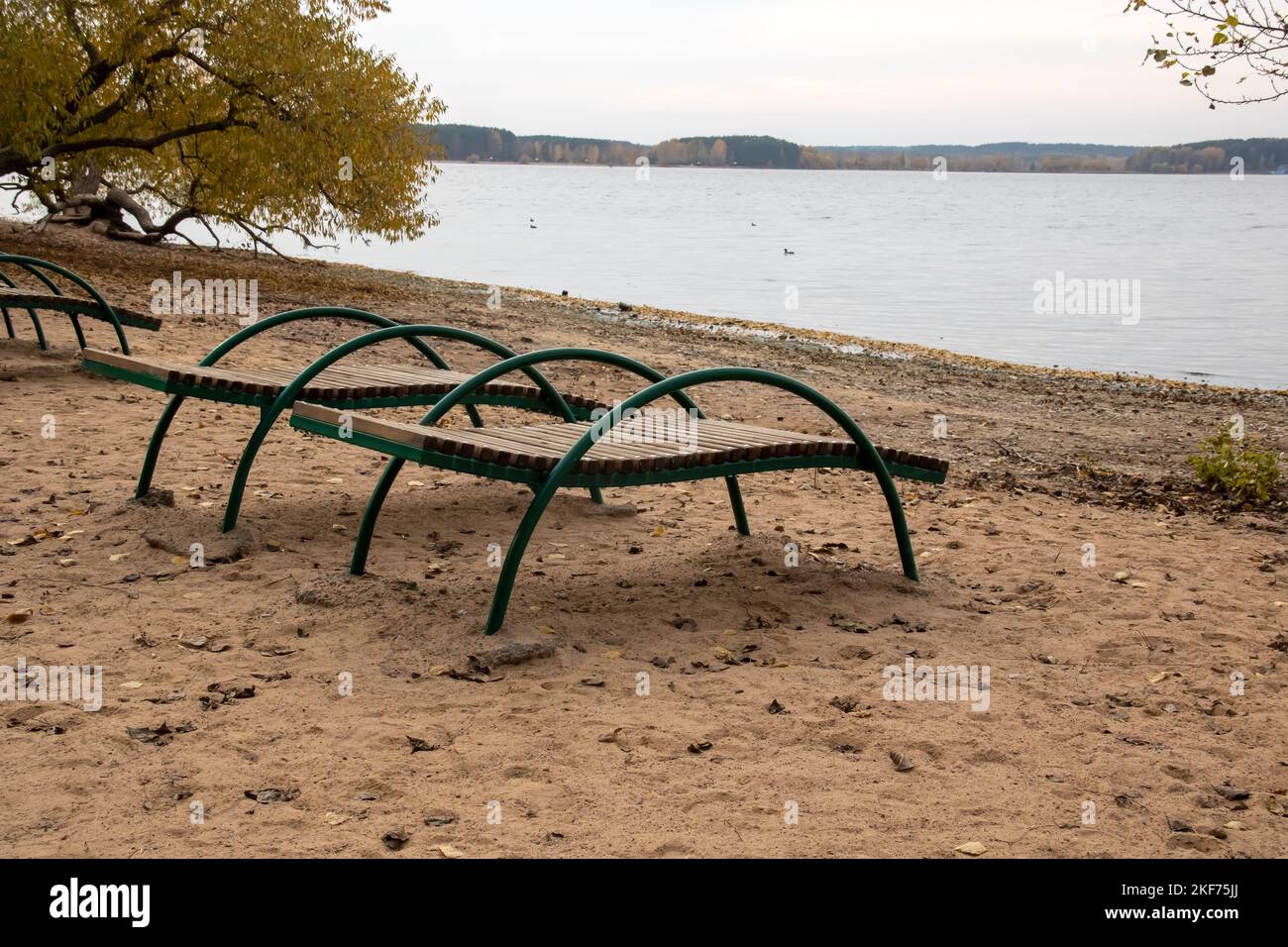 Empty sun loungers on the beach close up Stock Photo - Alamy