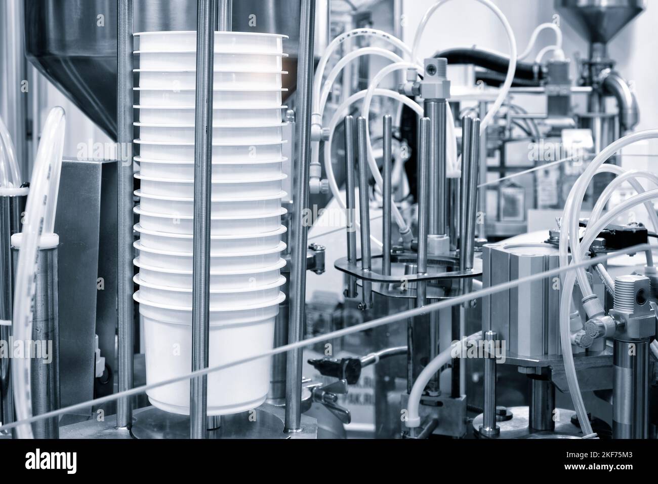 Plastic packaging production line, industrial concept Stock Photo - Alamy