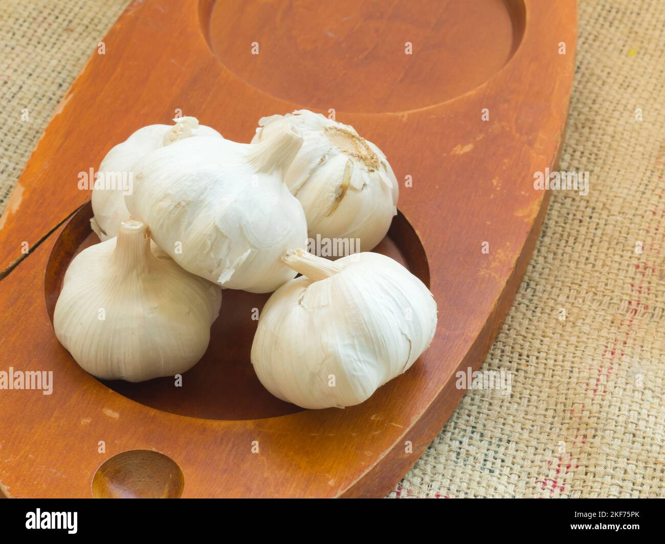 garlic in a wooden box , used for health purposes by people Stock Photo ...