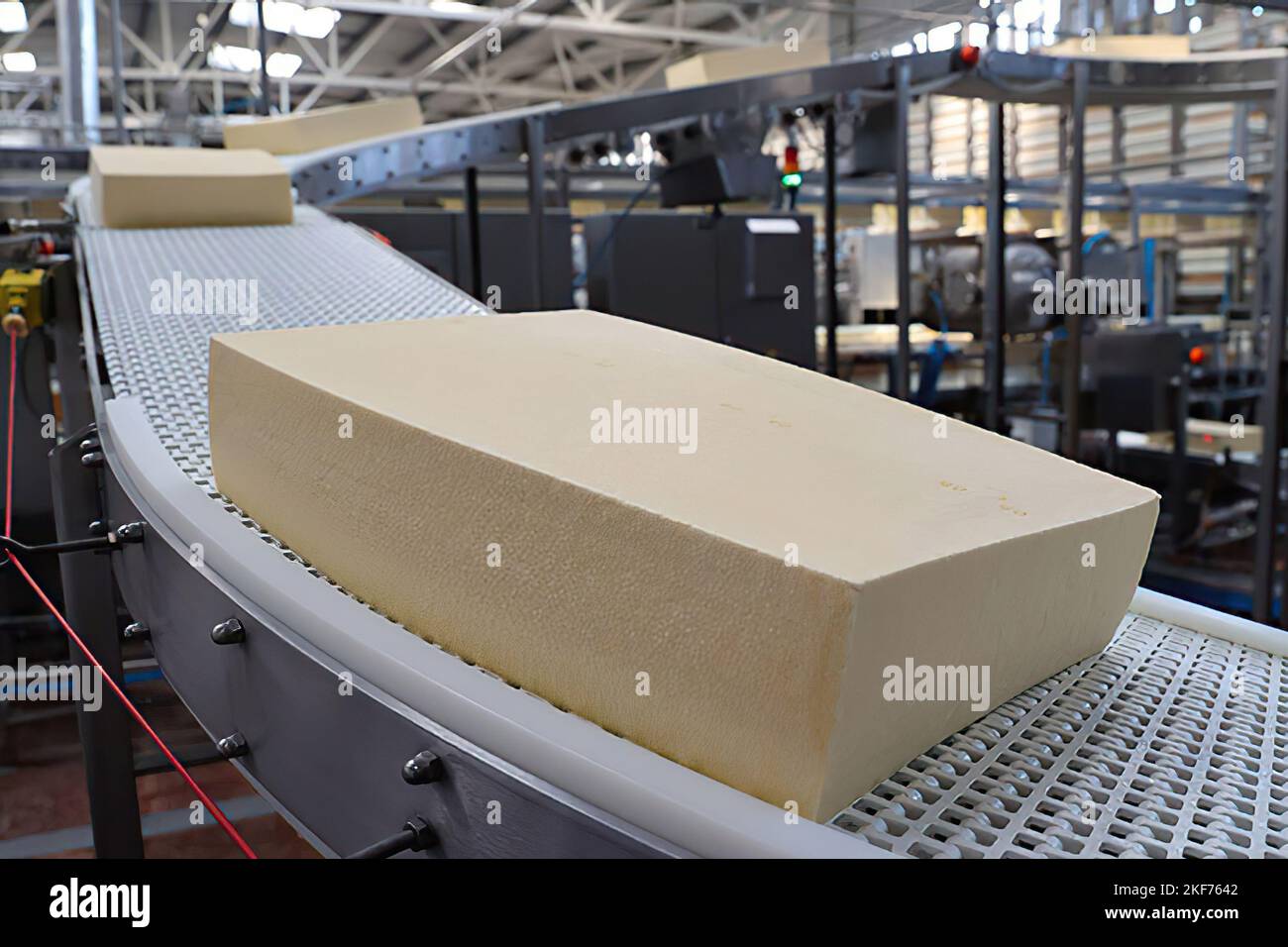 Dairy factory. Cheese line production Stock Photo - Alamy