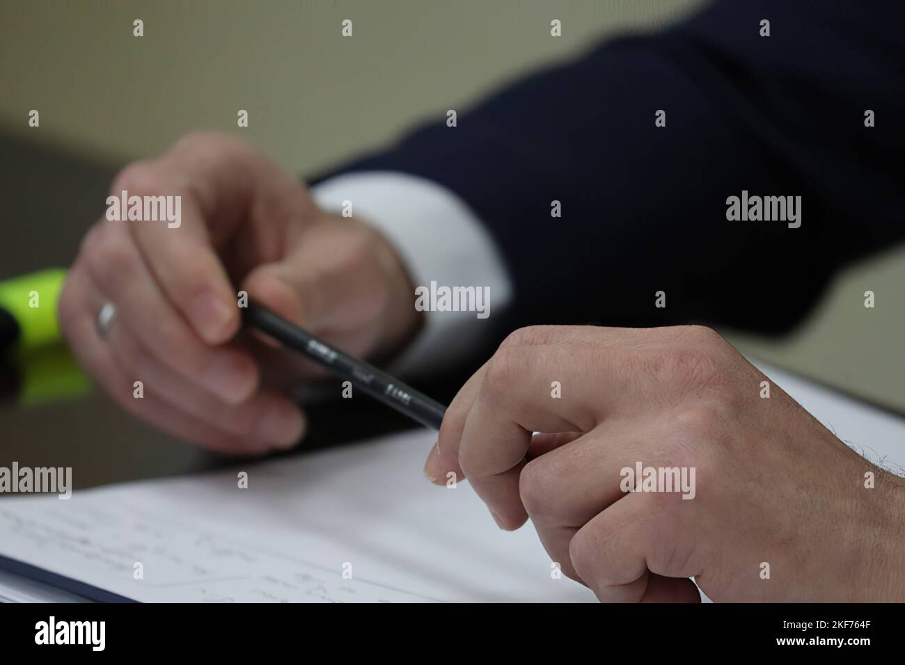 Mans hand signing document hi-res stock photography and images - Alamy