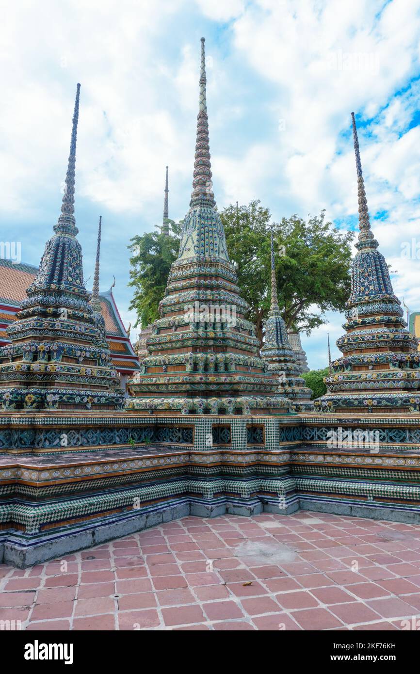 Typical ornate Buddhist towers at Wat Pho temple in Bangkok, Thailand ...