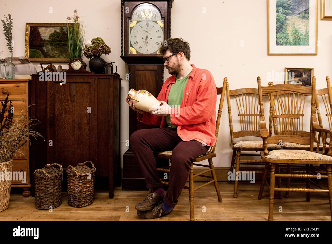 Picture of vintage shop owner Stock Photo - Alamy