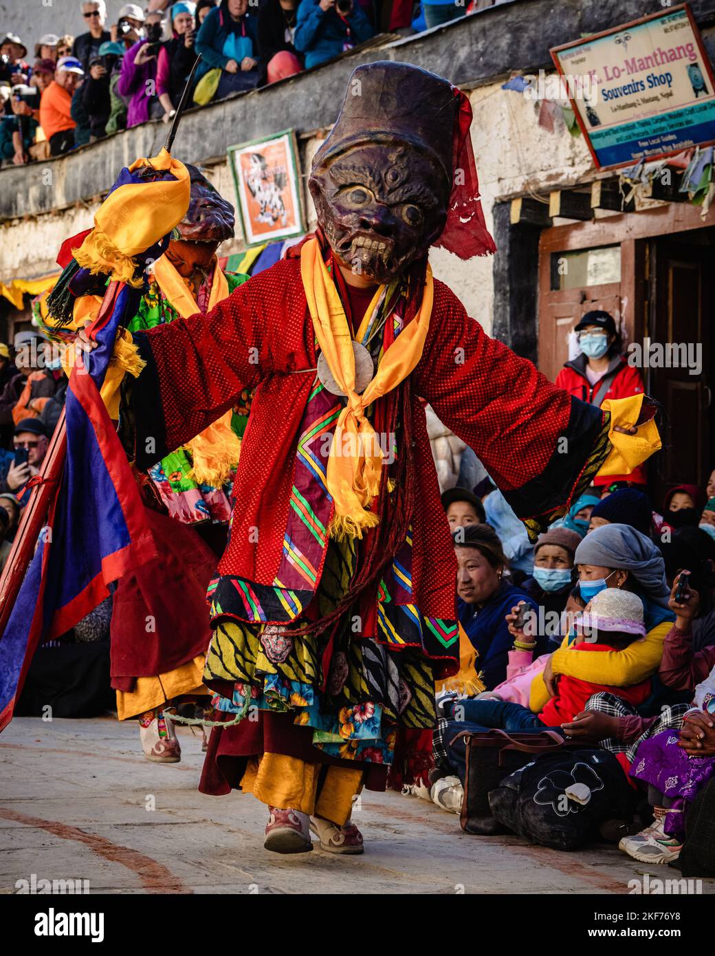 A Tibetan Buddhist in traditional demon ghost clothing in Ritual Dance ...