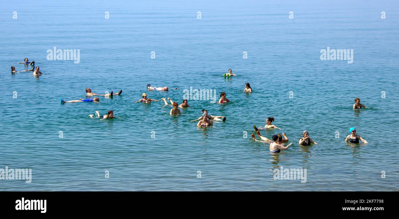 People bathing in the Dead Sea Jordan Stock Photo - Alamy