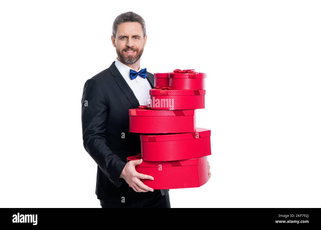 happy tuxedo man hold valentines day box. man in tuxedo holding gift ...