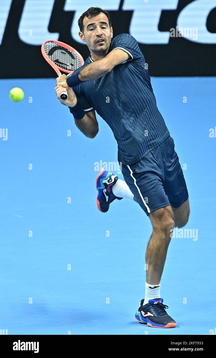 November 16, 2022, TURIN, Italia: Ivan Dodig of Croatia in action against Athanasios Kokkinakis ...
