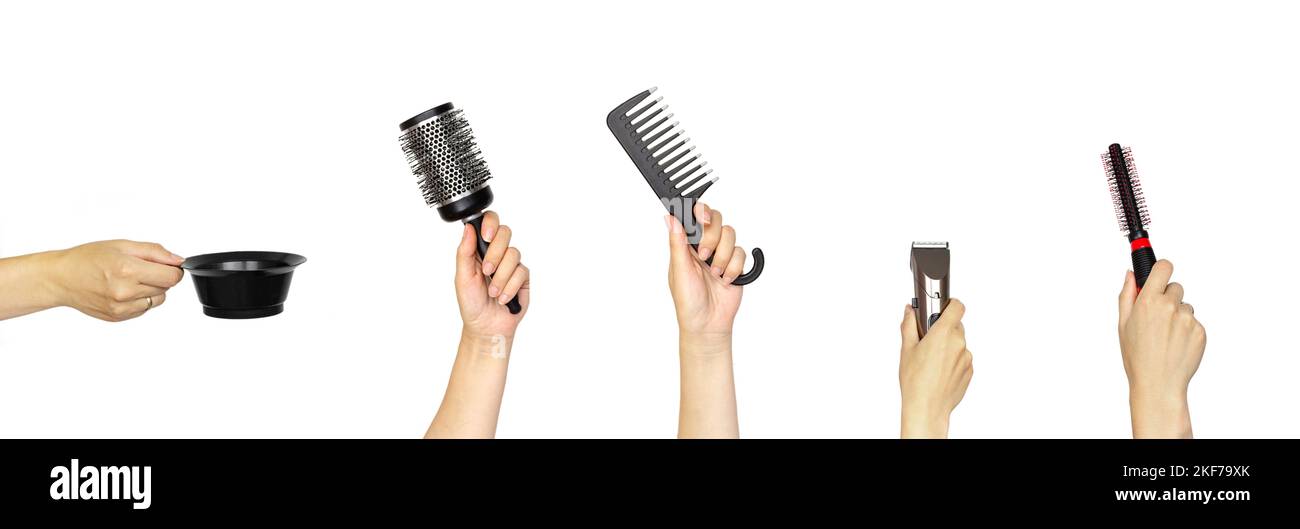Set professional hairdresser's set in hand with comb, scissors, hair ...