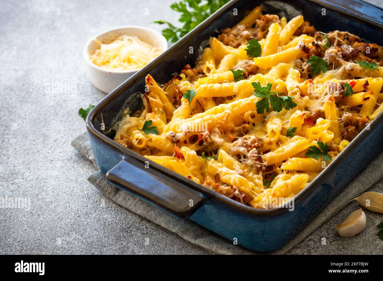Pasta penne with minced meat, cheese and creamy sauce Stock Photo - Alamy