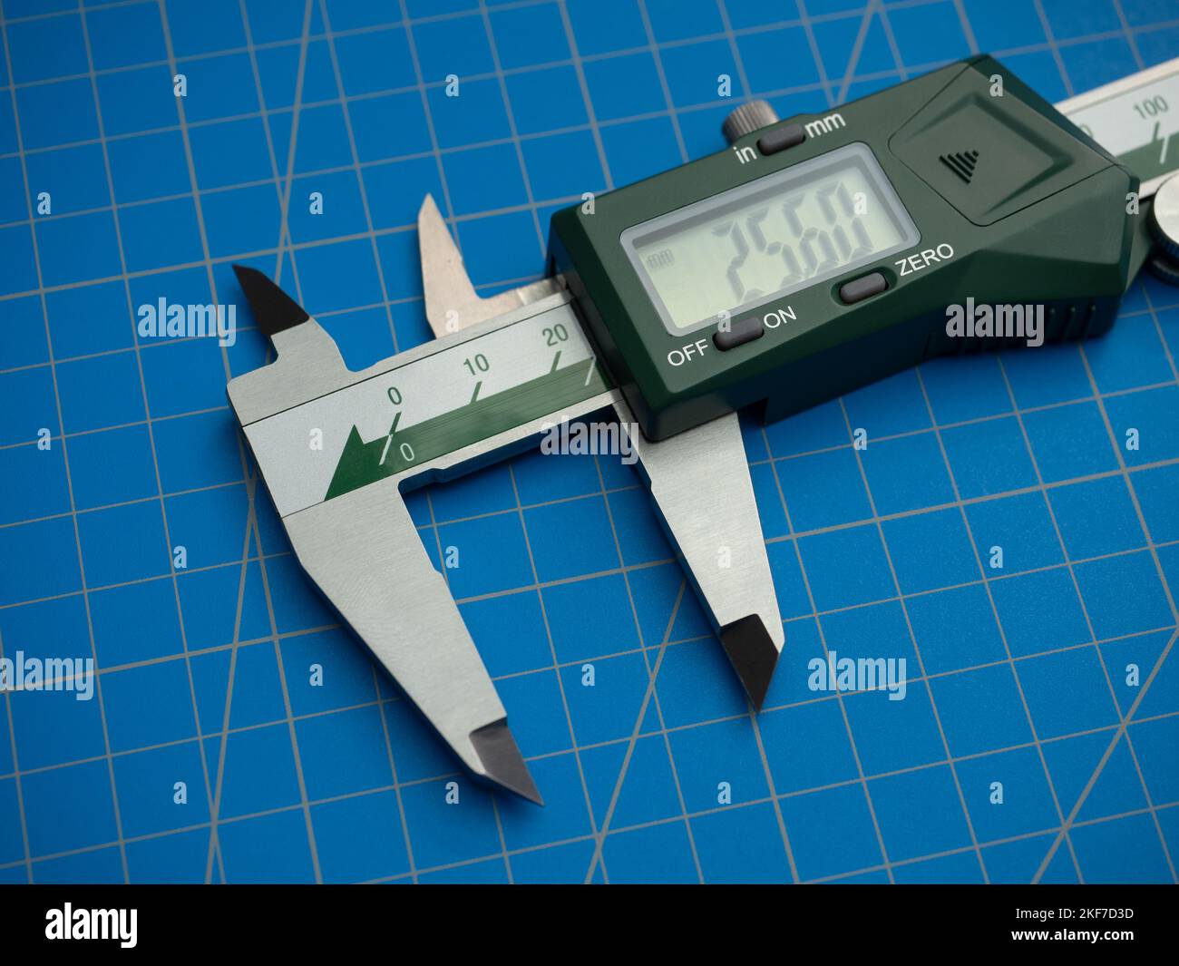 Photo of a digital vernier caliper with centimeters and millimeters on ...