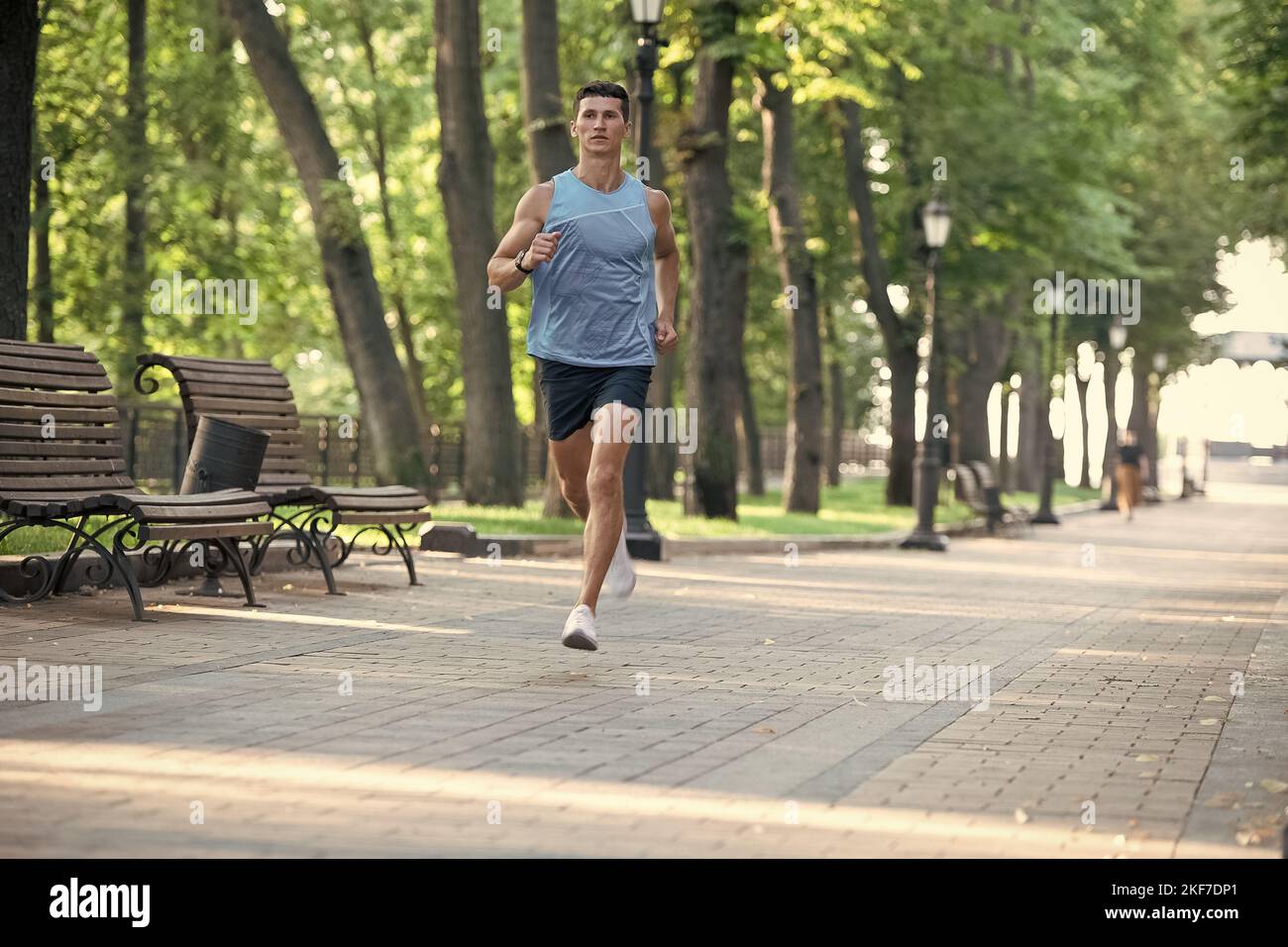 athletic man runner running in sportswear outdoor. anaerobic load Stock ...