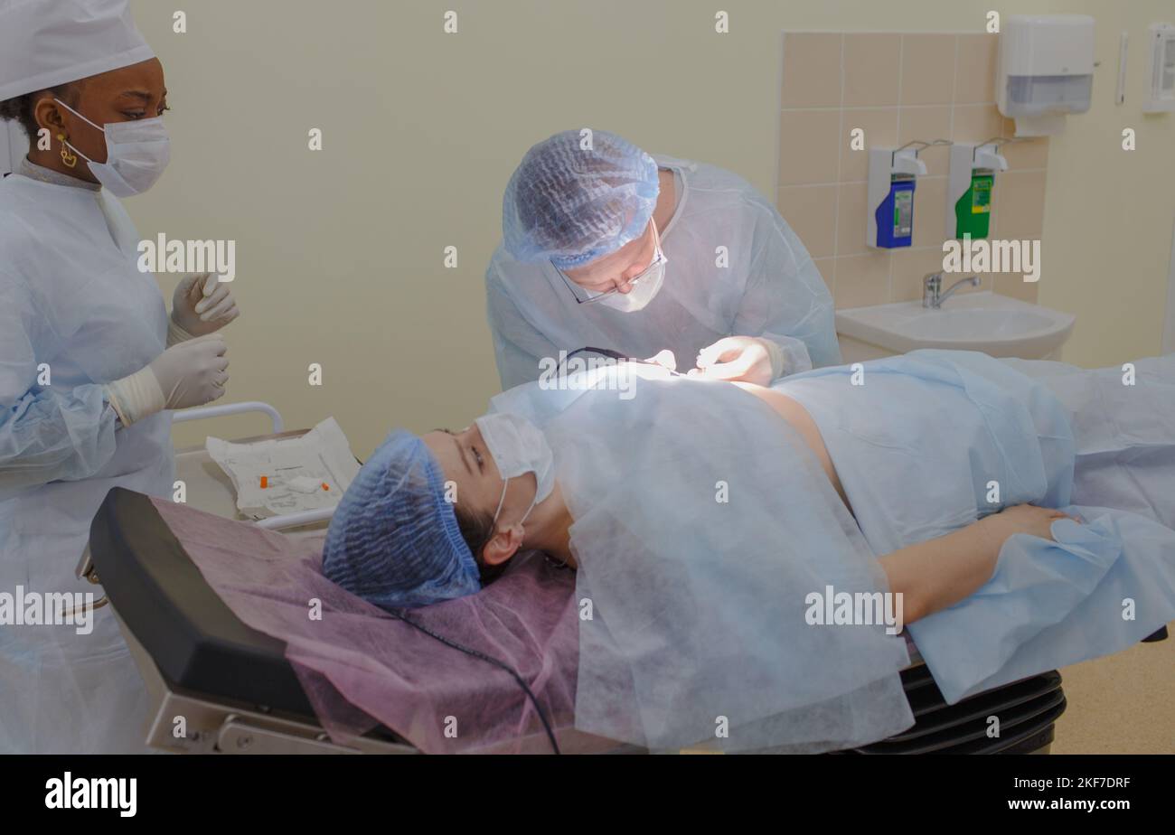 Patient lying on an operating table hi-res stock photography and images ...
