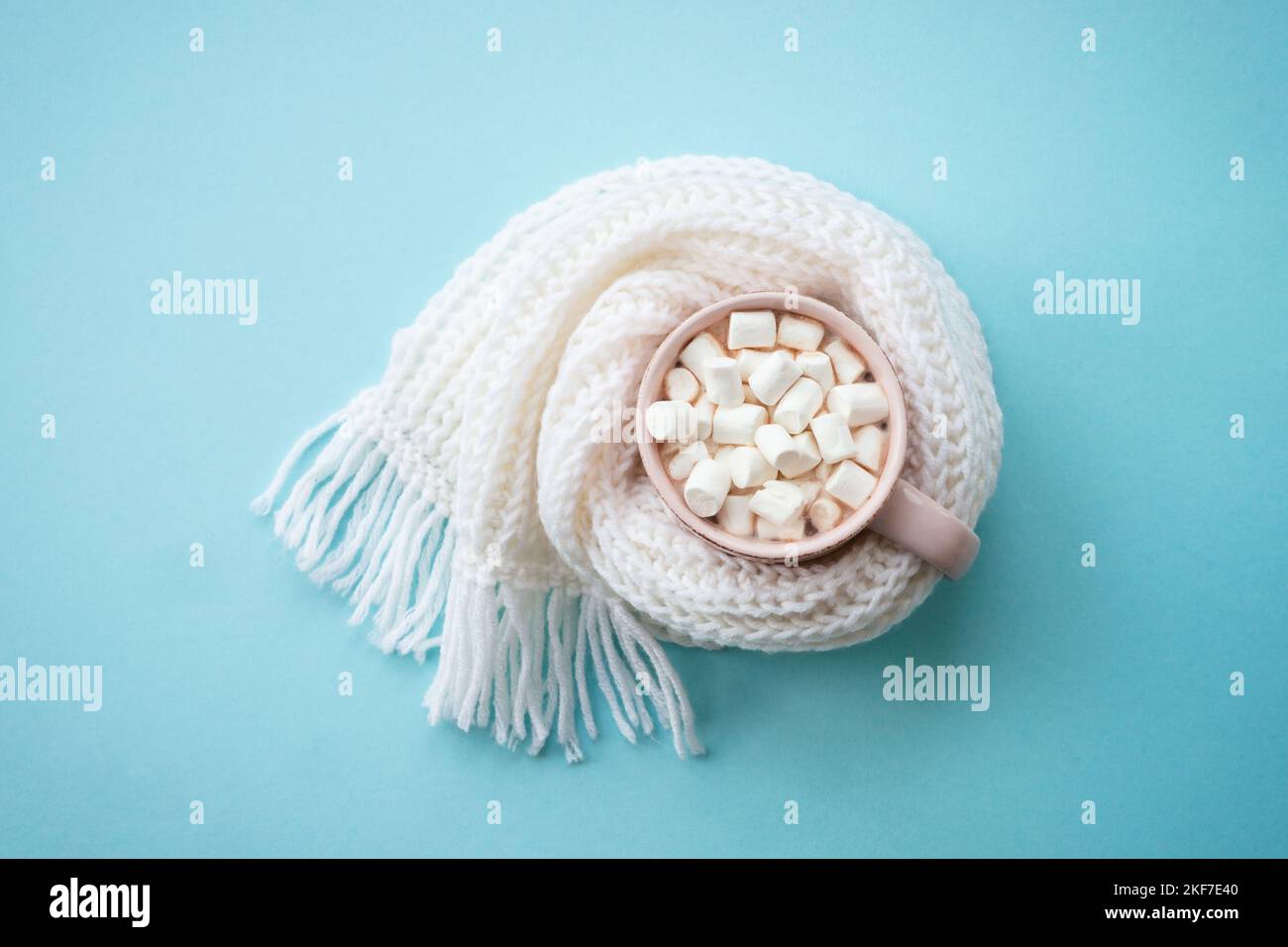 Hot chocolate with marshmallows on blue Stock Photo - Alamy