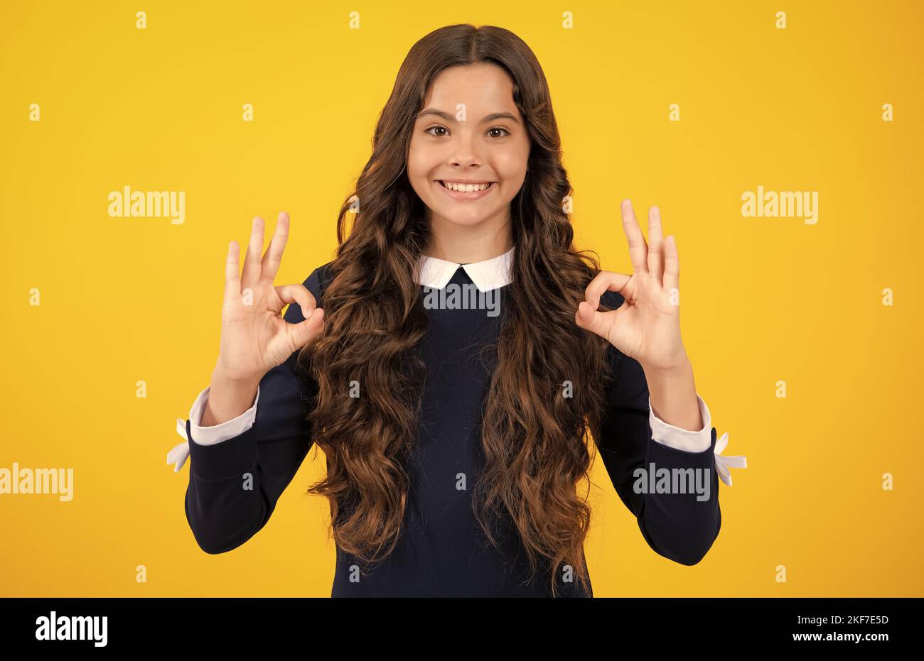 Okay. Portrait of a little teenager child girl showing okay gesture ...