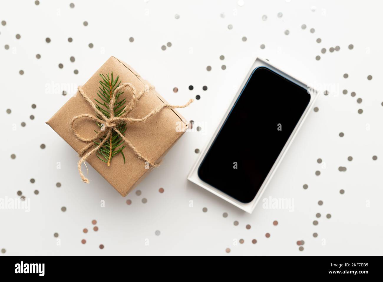 Gift box neat the box with phone. Idea for gift smartphone Stock Photo ...
