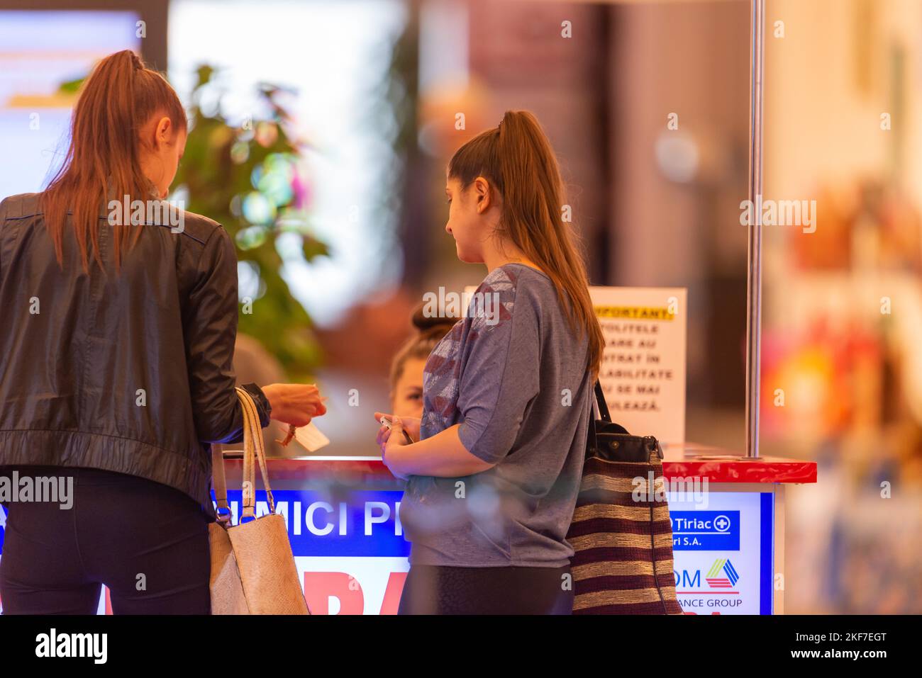 Timisoara, Romania - September 24, 2013: People walking inside a mall ...