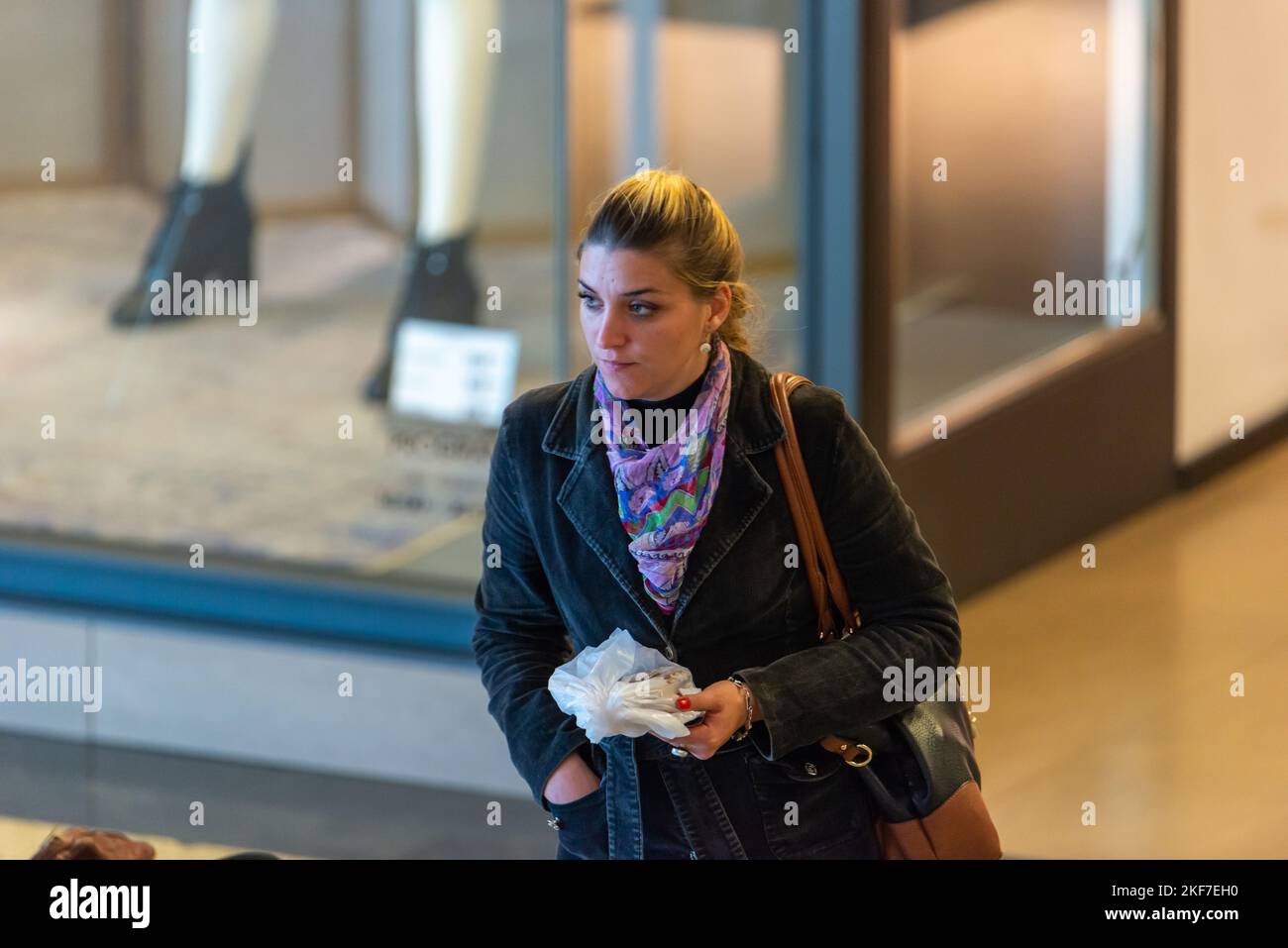 Timisoara, Romania - September 24, 2013: People walking inside a mall ...